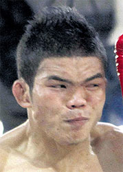 Bangkok Post - Suriyan defends against Sato in Tokyo today