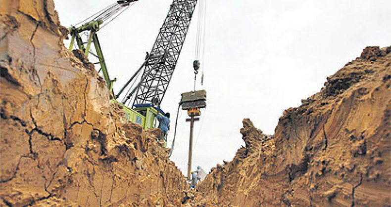 Bangkok Post - Dyke construction on track