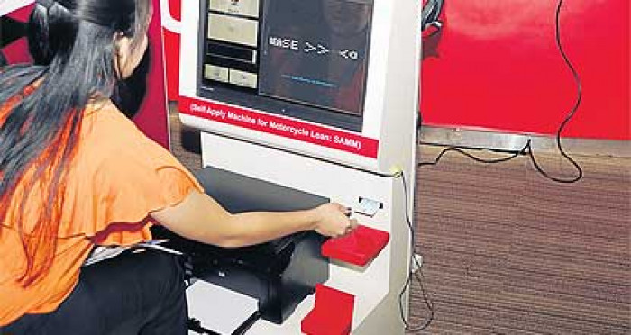 Bangkok Post - CIMBT offers consumer loan machines
