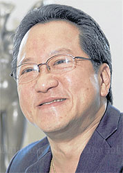 Bangkok Post - Boonchai defends his DTAC stake