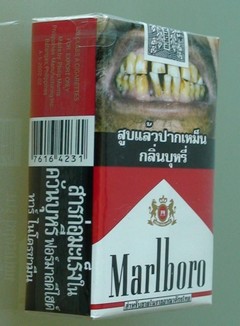 Bangkok Post - Big cigarette warnings draw dissent
