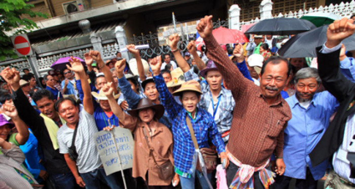 Bangkok Post - Rice farmers end rally, but threat implicit