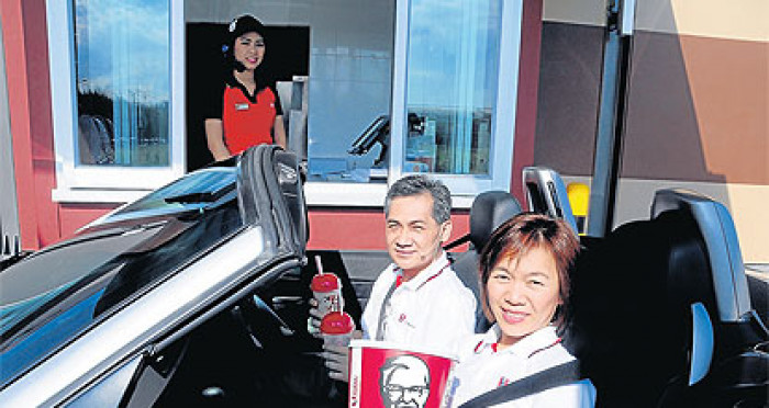 Bangkok Post - Finger-lickin' drivers welcome new KFCs