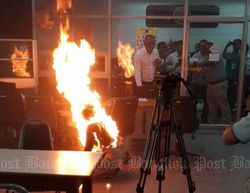 Bangkok Post - Woman sets herself on fire at help centre