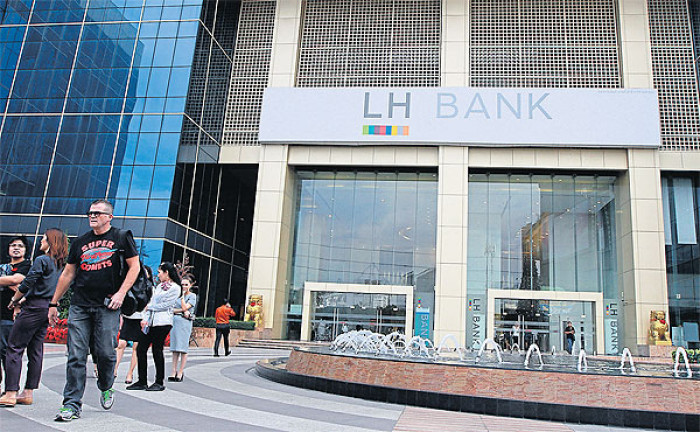 Bangkok Post - LH Bank shares surge on 'deal'