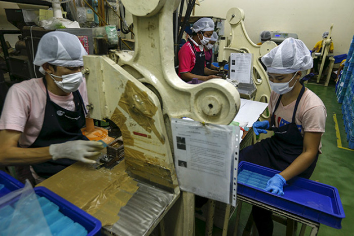 Bangkok Post - Factory output falls less than forecast in February