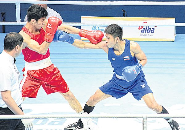 Bangkok Post - Rio-bound Chatchai strikes gold in China