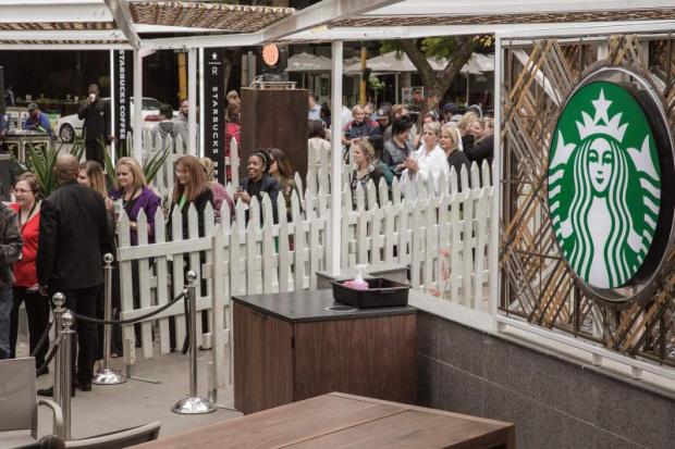 Bangkok Post - S. Africa's first Starbucks opens to long queues