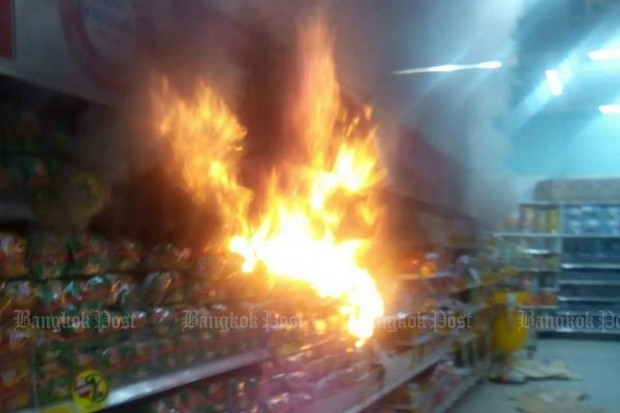 Bangkok Post - Arrest warrant for Tesco Lotus arson suspect dropped
