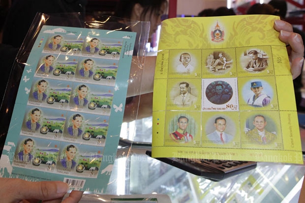 Bangkok Post - 9.9m stamps with King's portrait being handed out