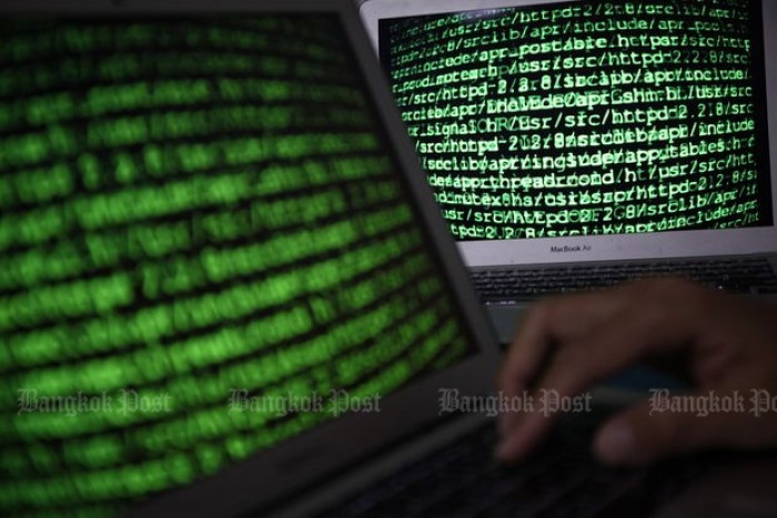 Bangkok Post - Nine suspects arrested for hacking websites