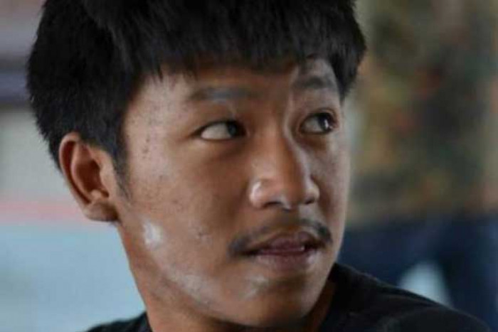 Bangkok Post - Jailed Pai's parents pick up his award