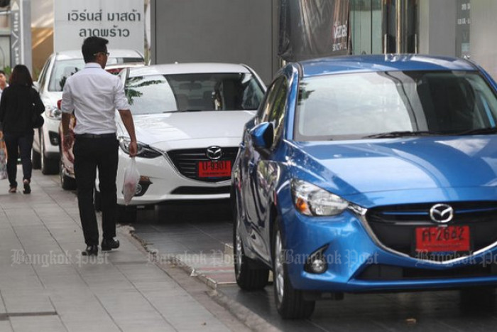 Bangkok Post - Red licence plates drive us to distraction