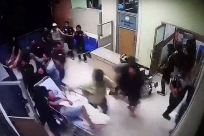 Bangkok Post - Police arrest seven after hospital brawl