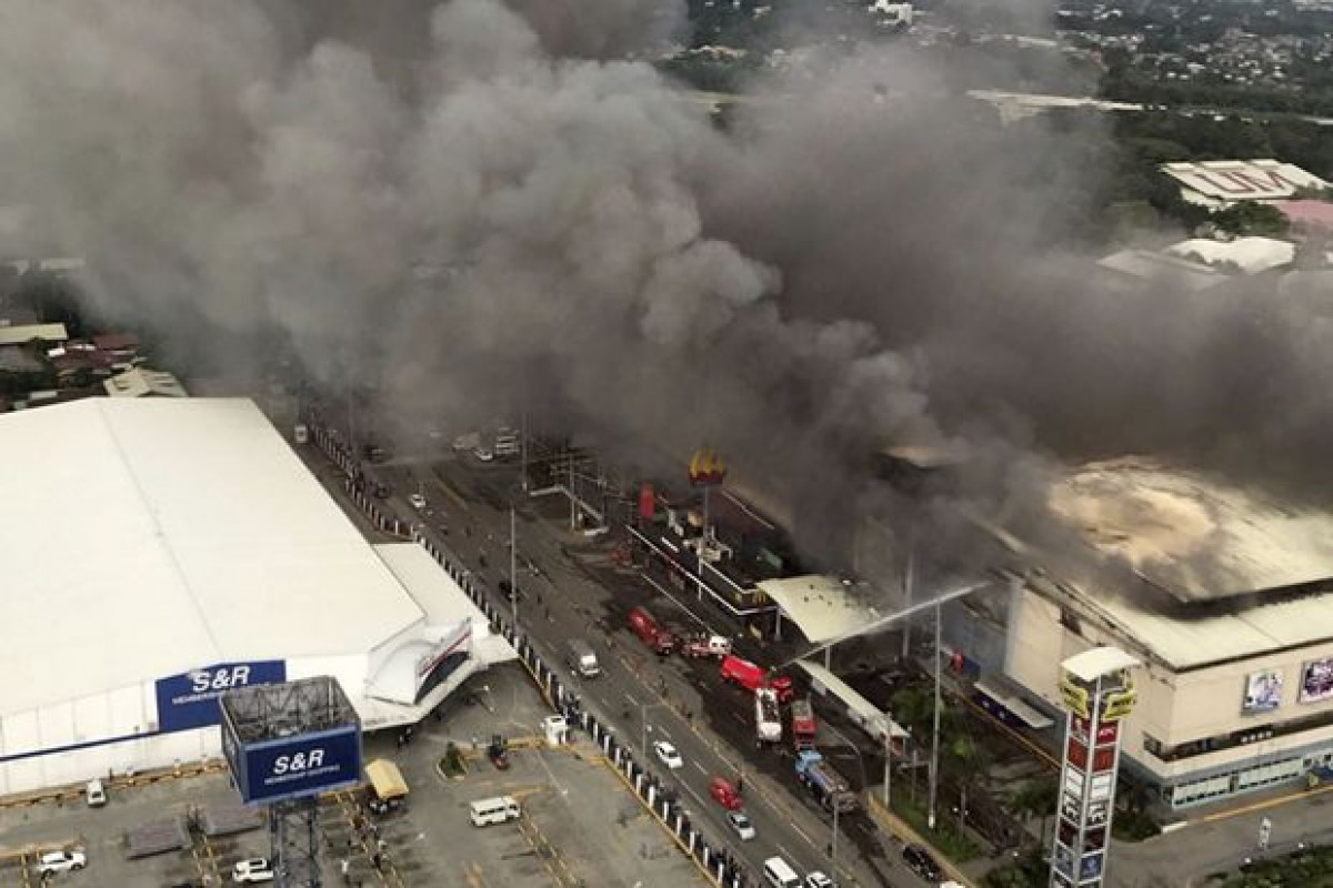 Bangkok Post - Filipino firefighters find all 37 bodies of workers in mall