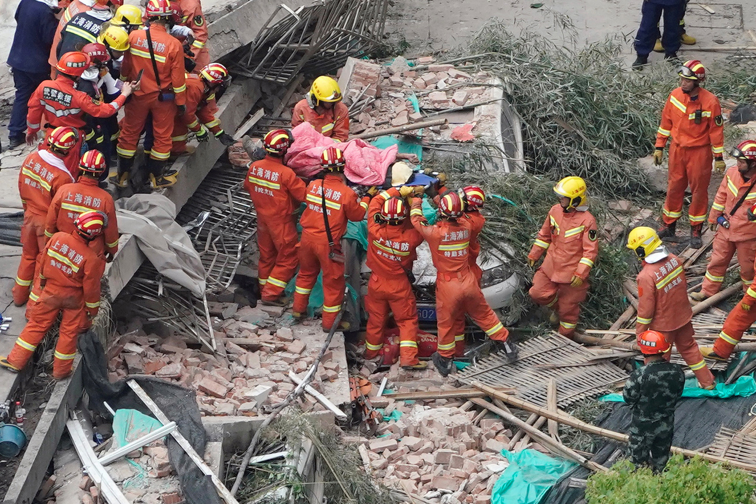 Bangkok Post - Nine trapped in Shanghai building collapse