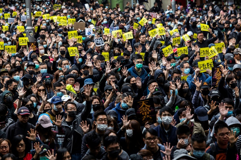 Bangkok Post - Tens of thousands march in Hong Kong pro-democracy rally