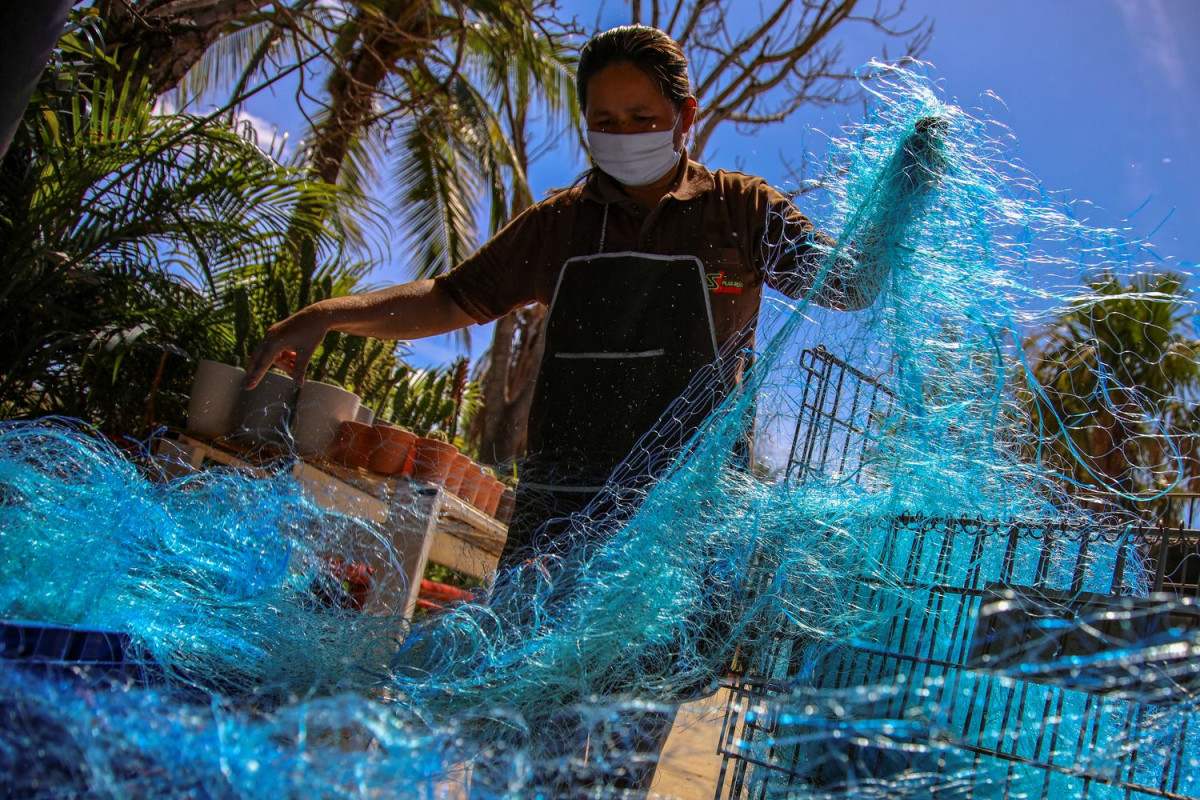 Bangkok Post - Project turns fishing nets into protection gear