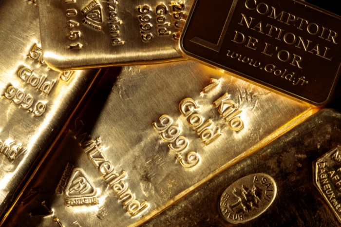 Gold hits record high on haven demand