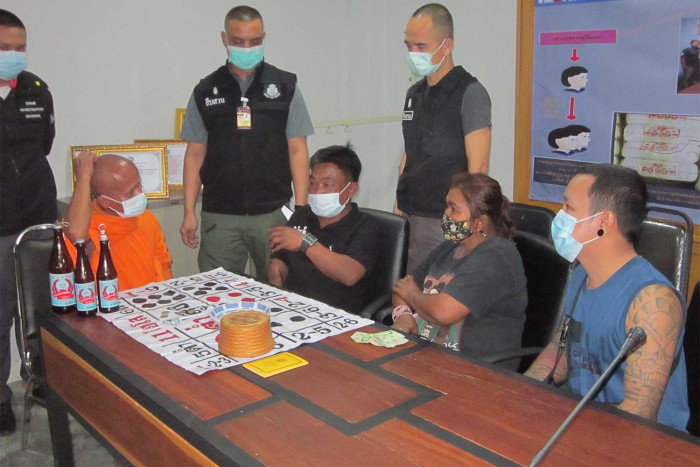 Bangkok Post - Monk, laymen caught gambling, drinking inside temple