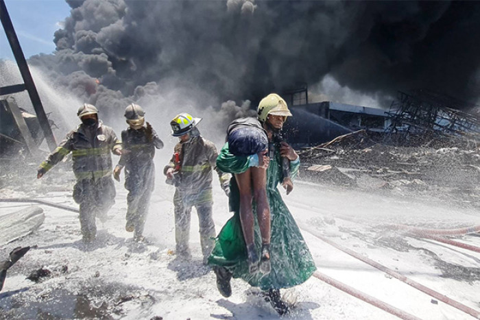 Bangkok Post - Factory inferno kills 1, at least 60 injured