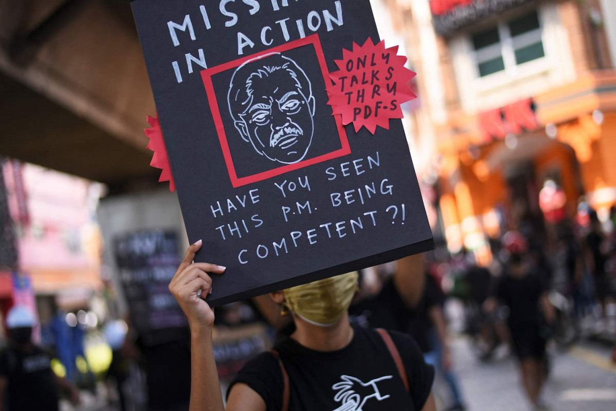 Bangkok Post - Black-clad Malaysians stage rare protest