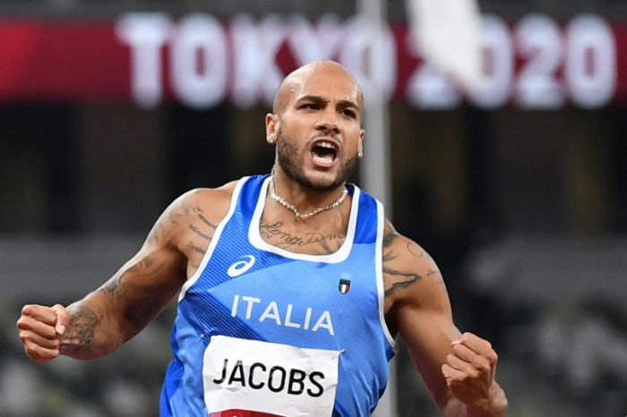 Bangkok Post - Jacobs storms to shock Olympic 100m crown as Italy ...