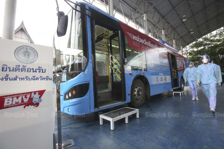 Bangkok Post - All aboard! Bus brings vaccines to Bangkok's vulnerable