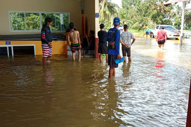Bangkok Post - Two rivers burst banks, flooding two Korat districts