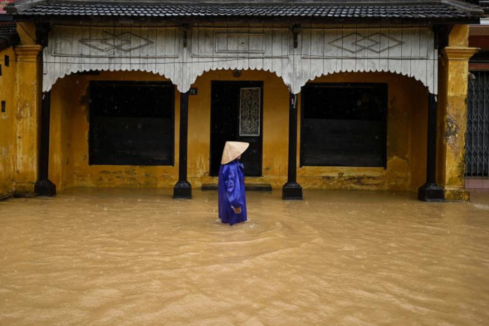 Bangkok Post - Rains trigger floods and landslides in Vietnam, 18 missing