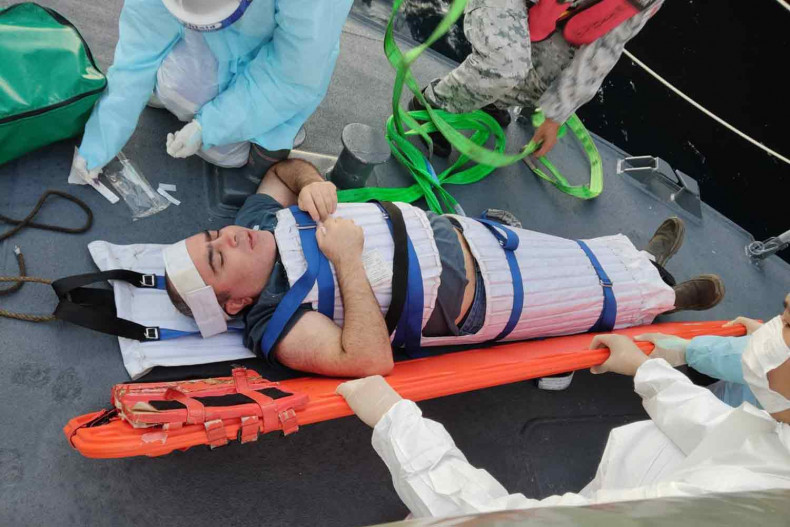 Bangkok Post - Navy boat mercy dash after ship's engineer stricken at sea