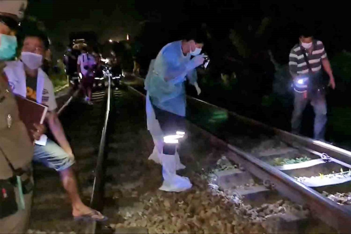 Bangkok Post - Man lying on tracks run over by train