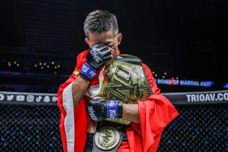 Bangkok Post - China's first male MMA champ mobbed by fans on visit ...