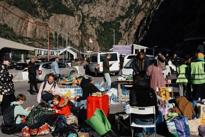 Bangkok Post - Panic, bribes, ditched cars and a dash on foot: Portraits of flight from Russia