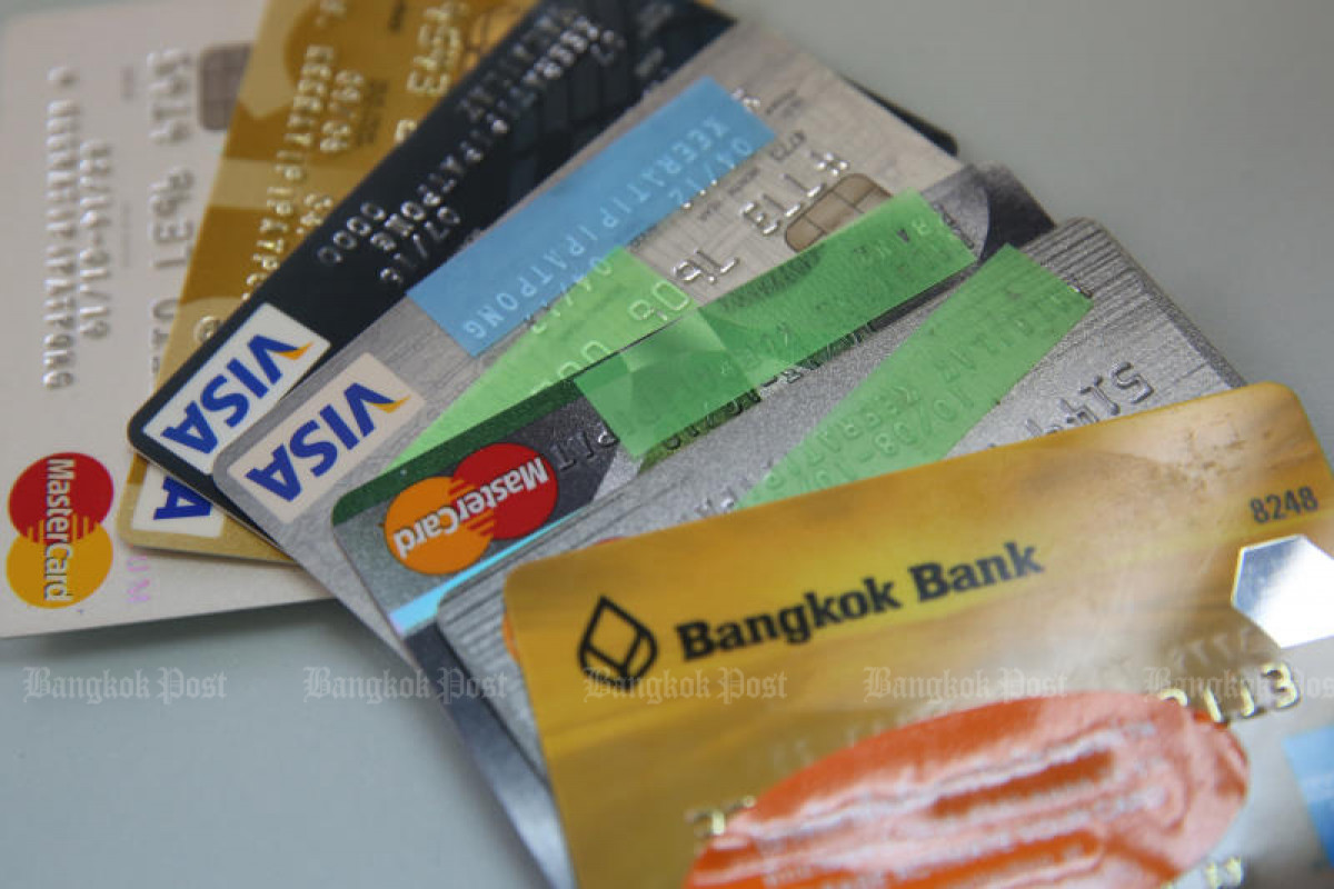 Bangkok Post - Credit card firms to meet BoT as debt accumulates