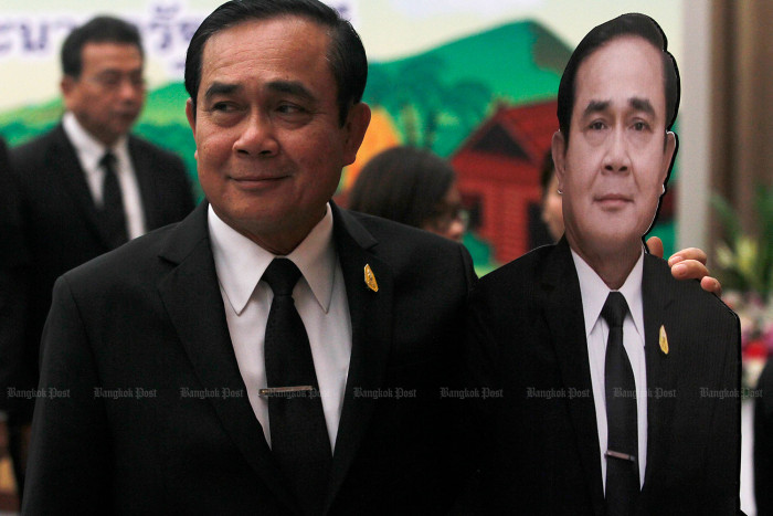 Bangkok Post - PM shrugs off defection talk