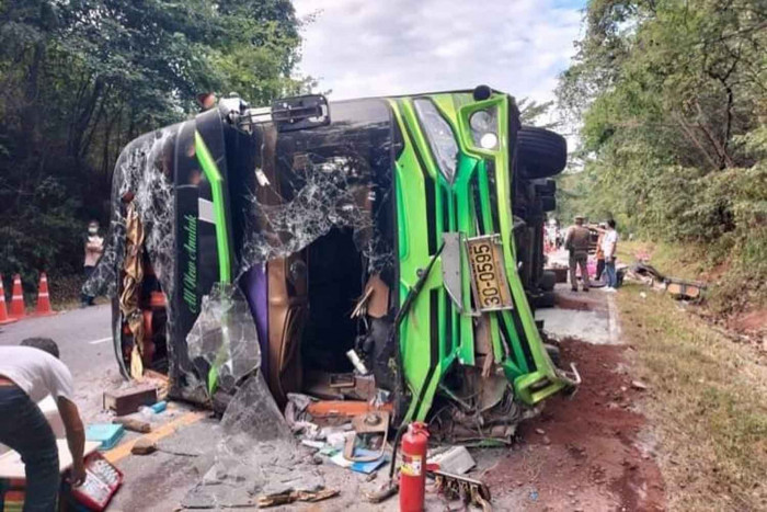 Bangkok Post - Tour bus overturns, 1 killed, 46 injured