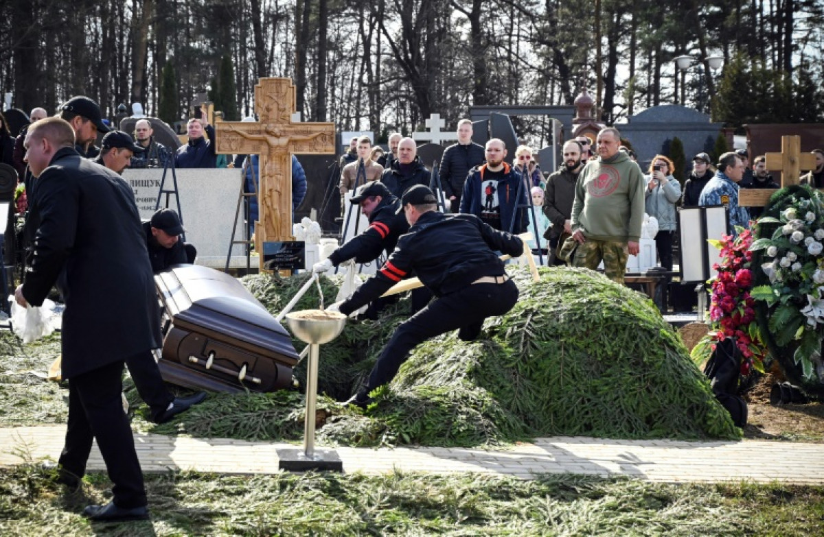 Bangkok Post - Russian military blogger's funeral draws hundreds
