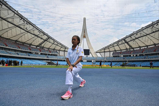 Bangkok Post - Last-place runner is the toast of Cambodia