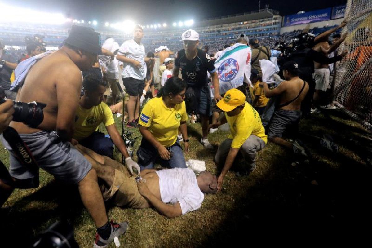 Bangkok Post - 9 dead in El Salvador stadium stampede at football match ...