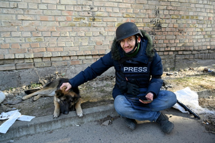 Bangkok Post - Macron pays tribute to slain AFP reporter Arman Soldin