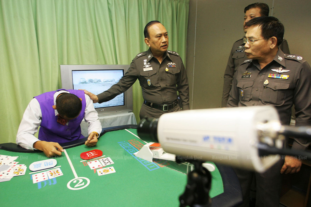 Bangkok Post - Cops nab 17 in raid over illegal site