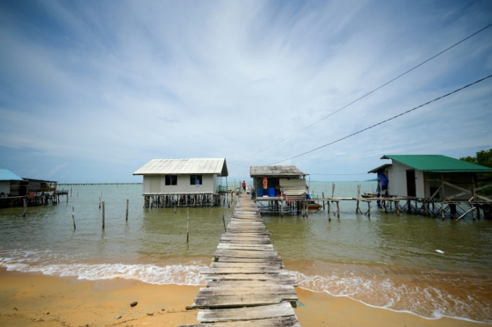 Bangkok Post - 'Save our village': Indonesians resist eviction for ...