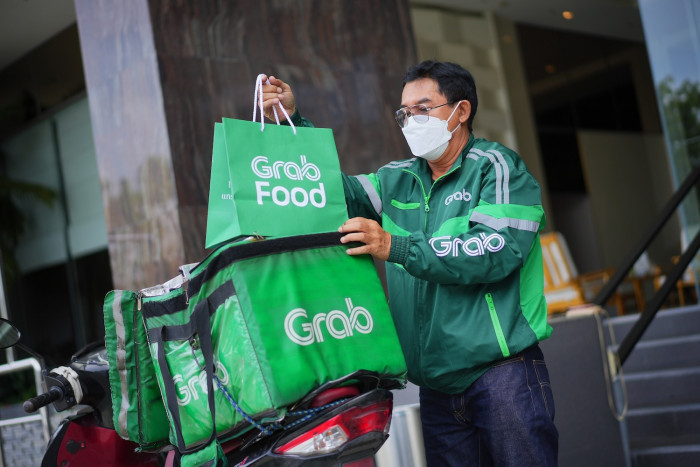 Bangkok Post - Grab delivers first-ever profit