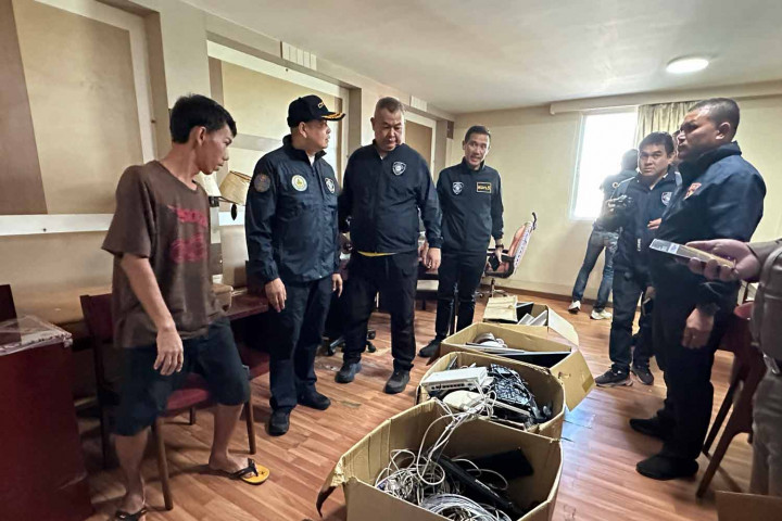 Bangkok Post - Local politician at large in big call scam case