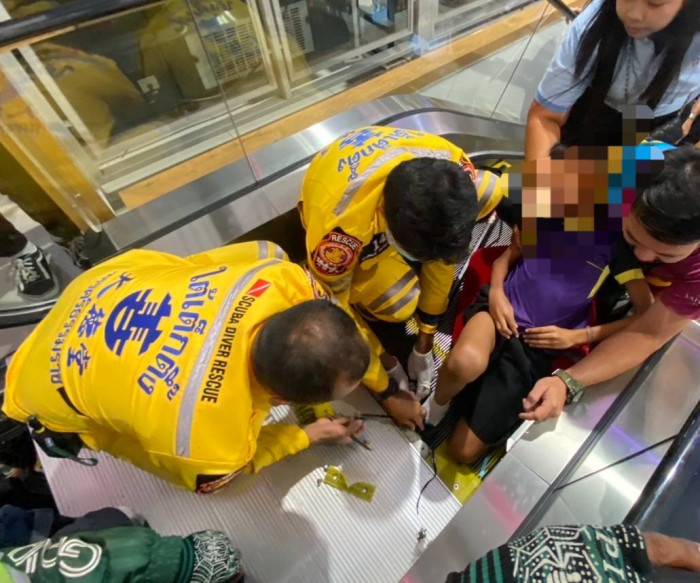 Bangkok Post - Child injured after foot caught in escalator at shopping mall
