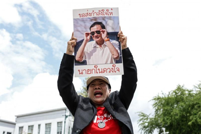 Bangkok Post - Election Commission says Thaksin did not influence six parties