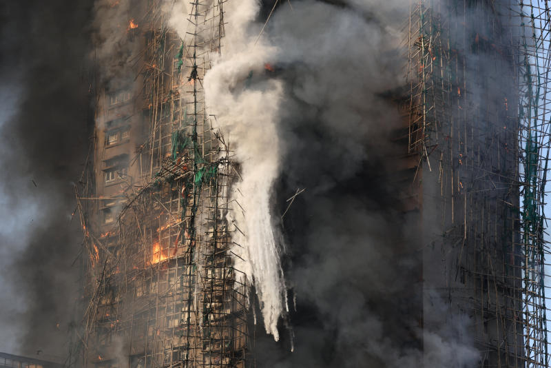 Bangkok Post - At least 13 dead in Hong Kong high-rise blaze