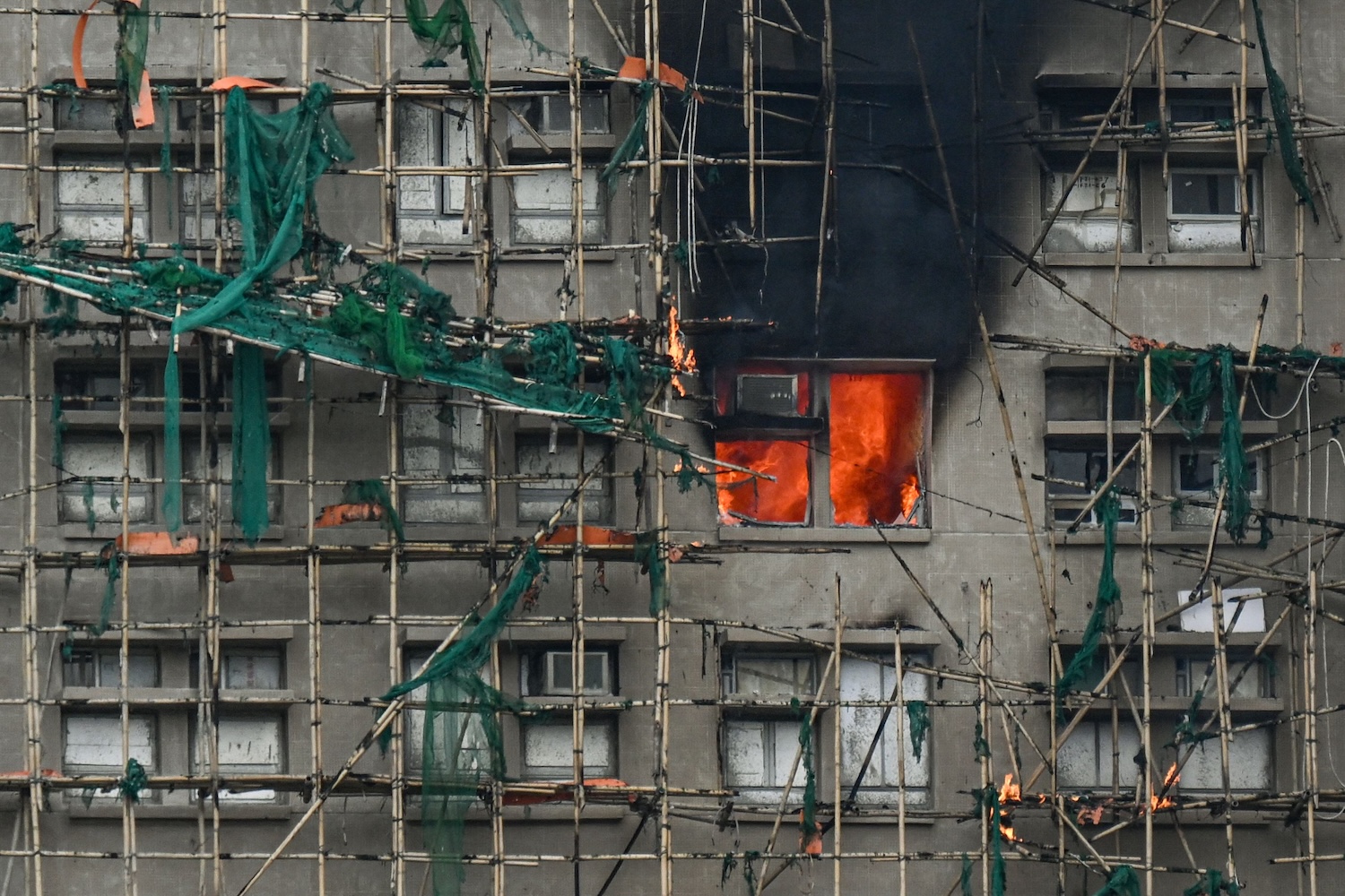 Bangkok Post - ‘Very worried’: Hong Kong fire survivors hunt for the ...