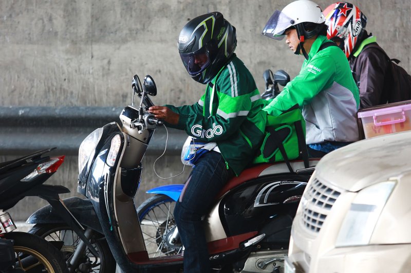 Bangkok Post - Grab-Line Man duopoly tightens its grip